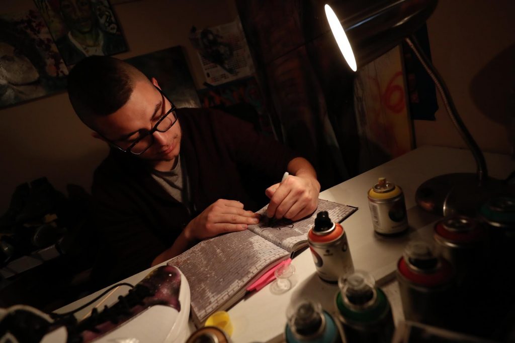 This graffiti artist is different; UNK alumnus Josh Arias uses art to ...