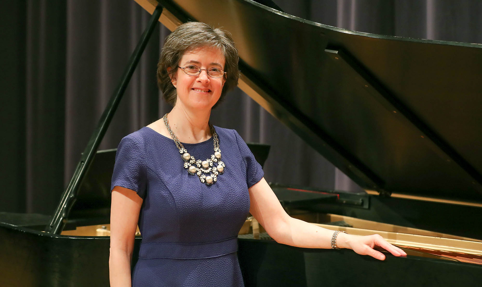 Overcoming hearing loss, UNK professor Dawn Mollenkopf ready for first ...