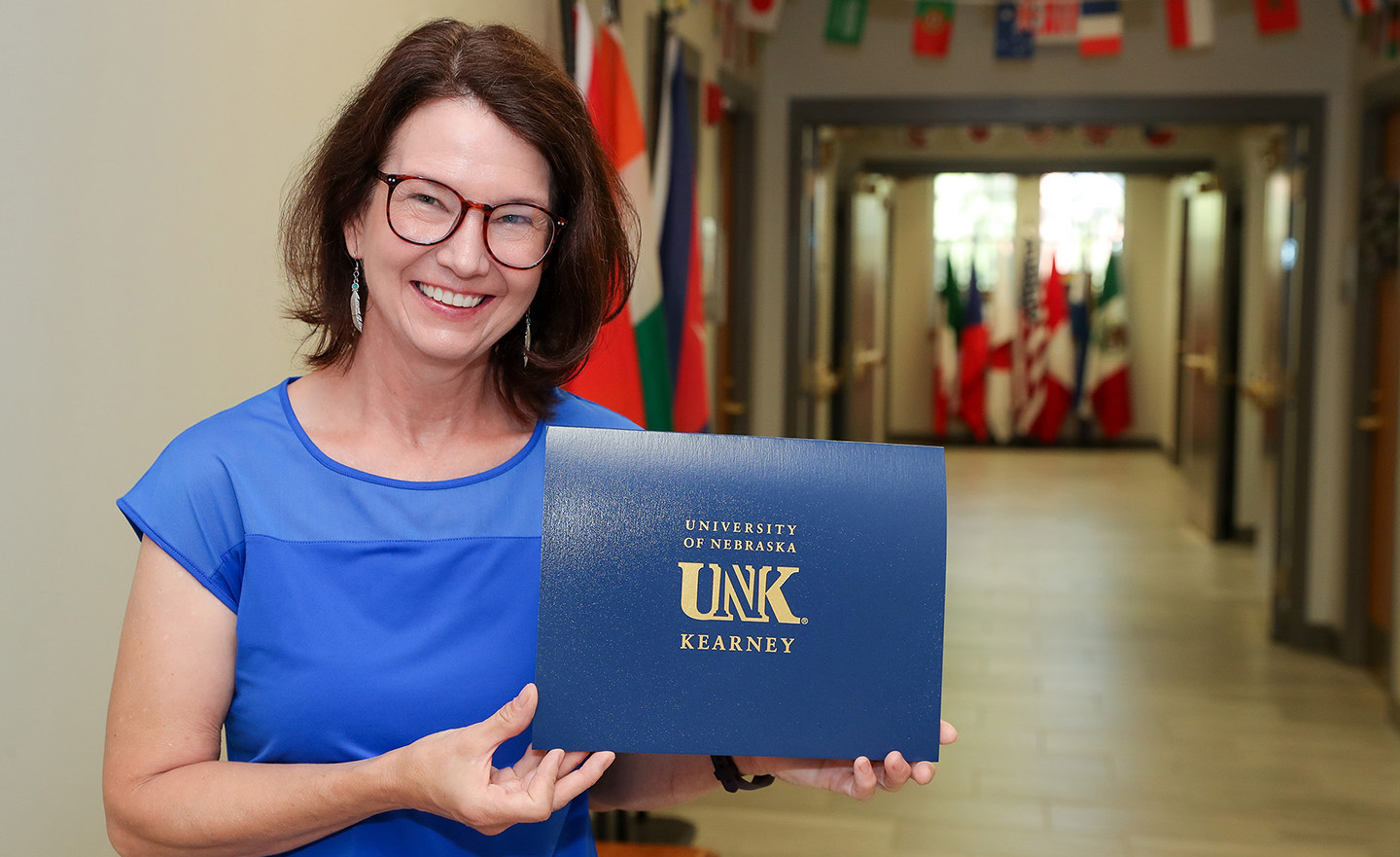 ‘Just go for it’: Beth Montag completes master’s program 39 years after ...