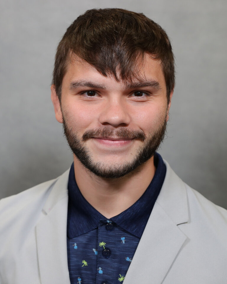 Josh Portillo, UNMC Dean Kyle Meyer speaking Friday at UNK winter ...